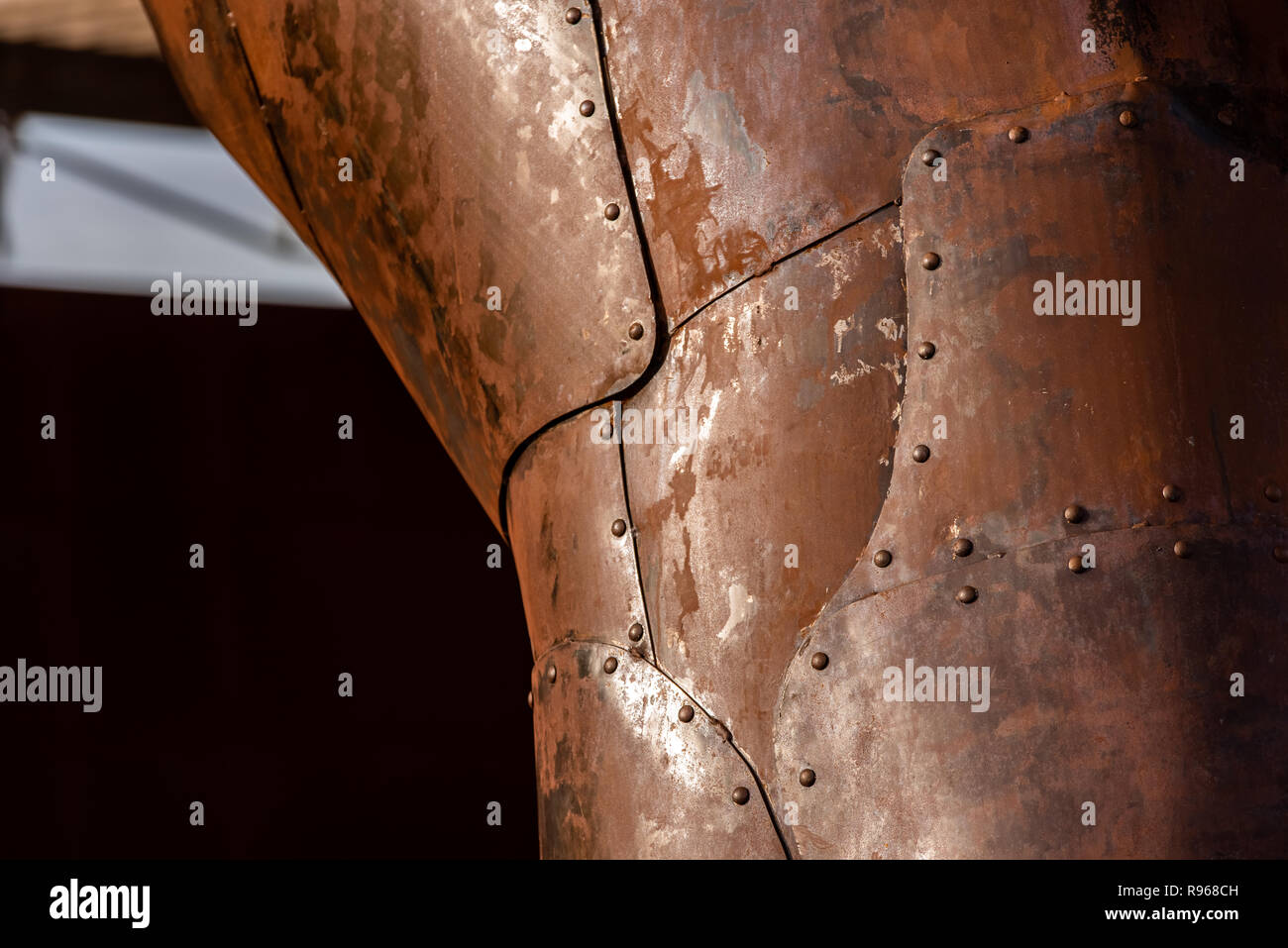 Rusted steel plates joined with rivets Stock Photo - Alamy
