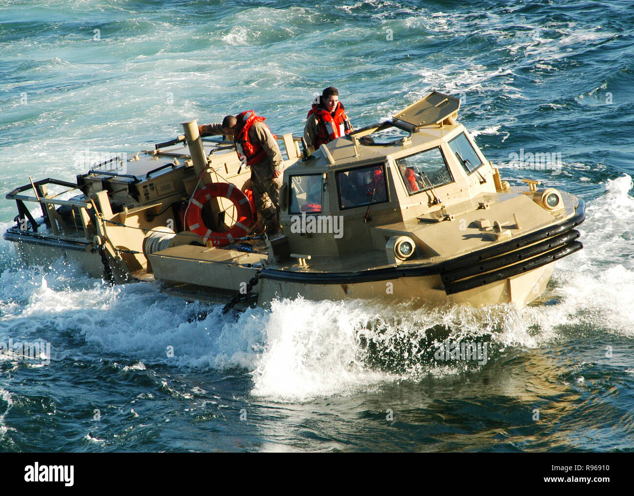 A Navy Lighter, Amphibious Resupply, Cargo Vehicle-LARC- heads toward ...