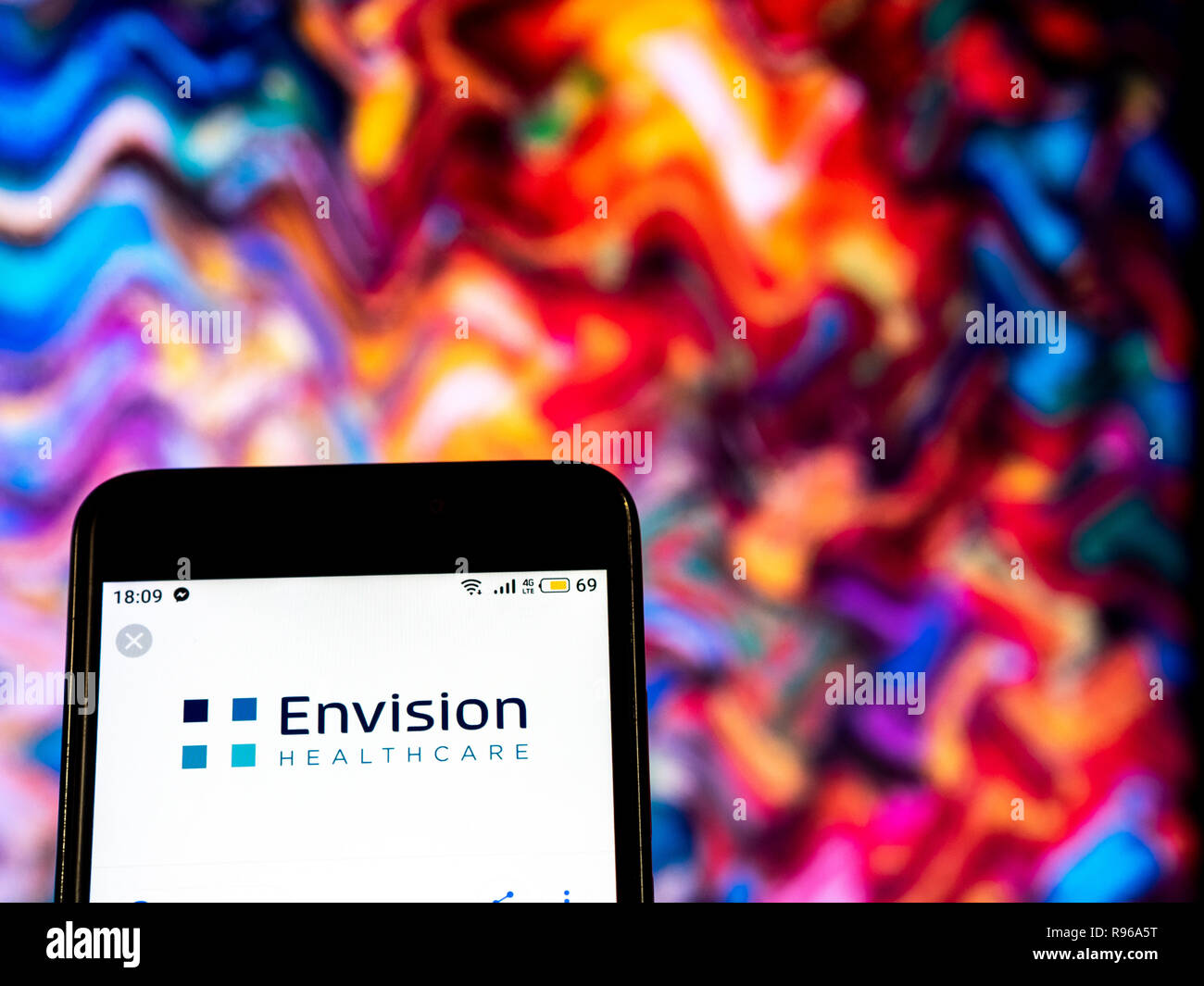 Envision Healthcare Healthcare company logo seen displayed on smart ... Envision Healthcare Healthcare company logo seen displayed on smart ...