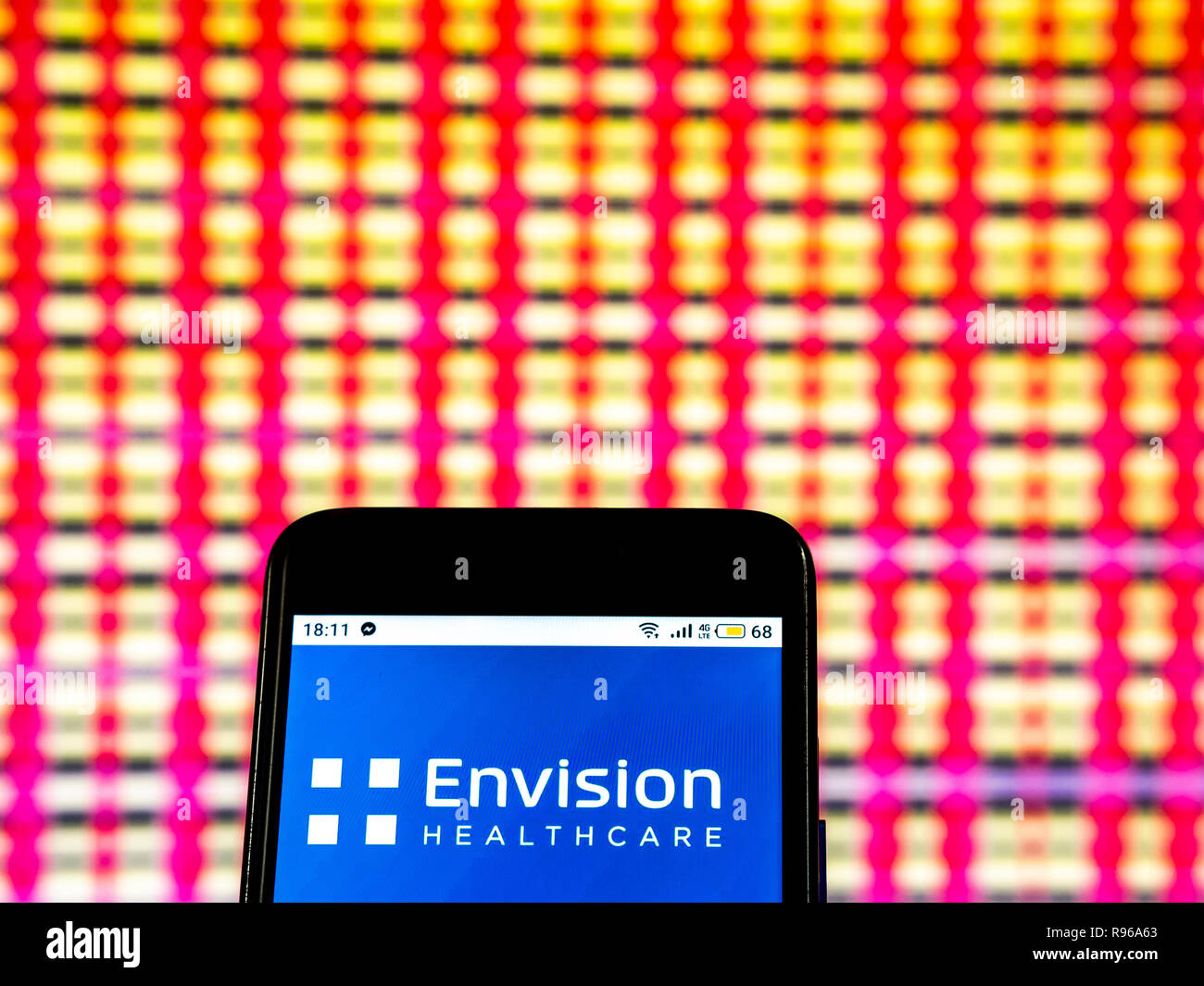 Envision Healthcare Healthcare company logo seen displayed on smart ... Envision Healthcare Healthcare company logo seen displayed on smart ...