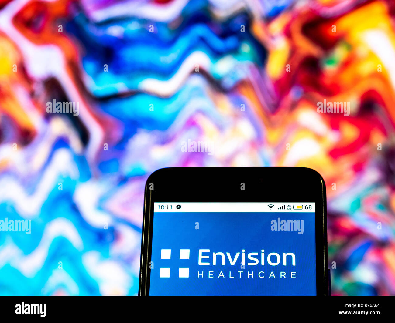 Envision Healthcare Healthcare company logo seen displayed on smart ... Envision Healthcare Healthcare company logo seen displayed on smart ...