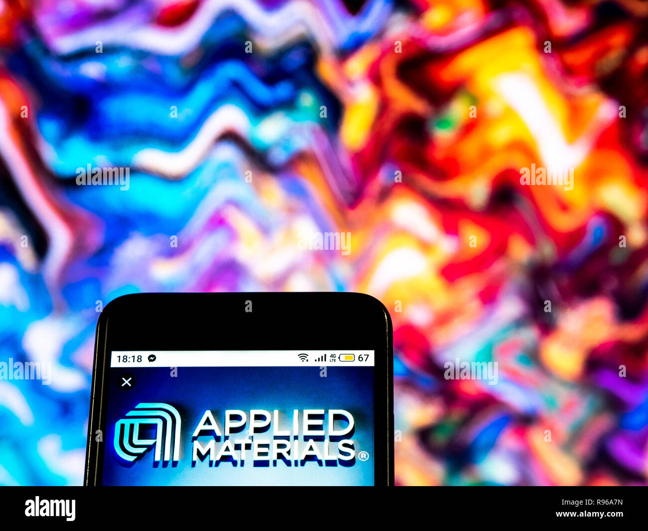 Applied Materials Manufacturing company logo seen displayed on smart ...