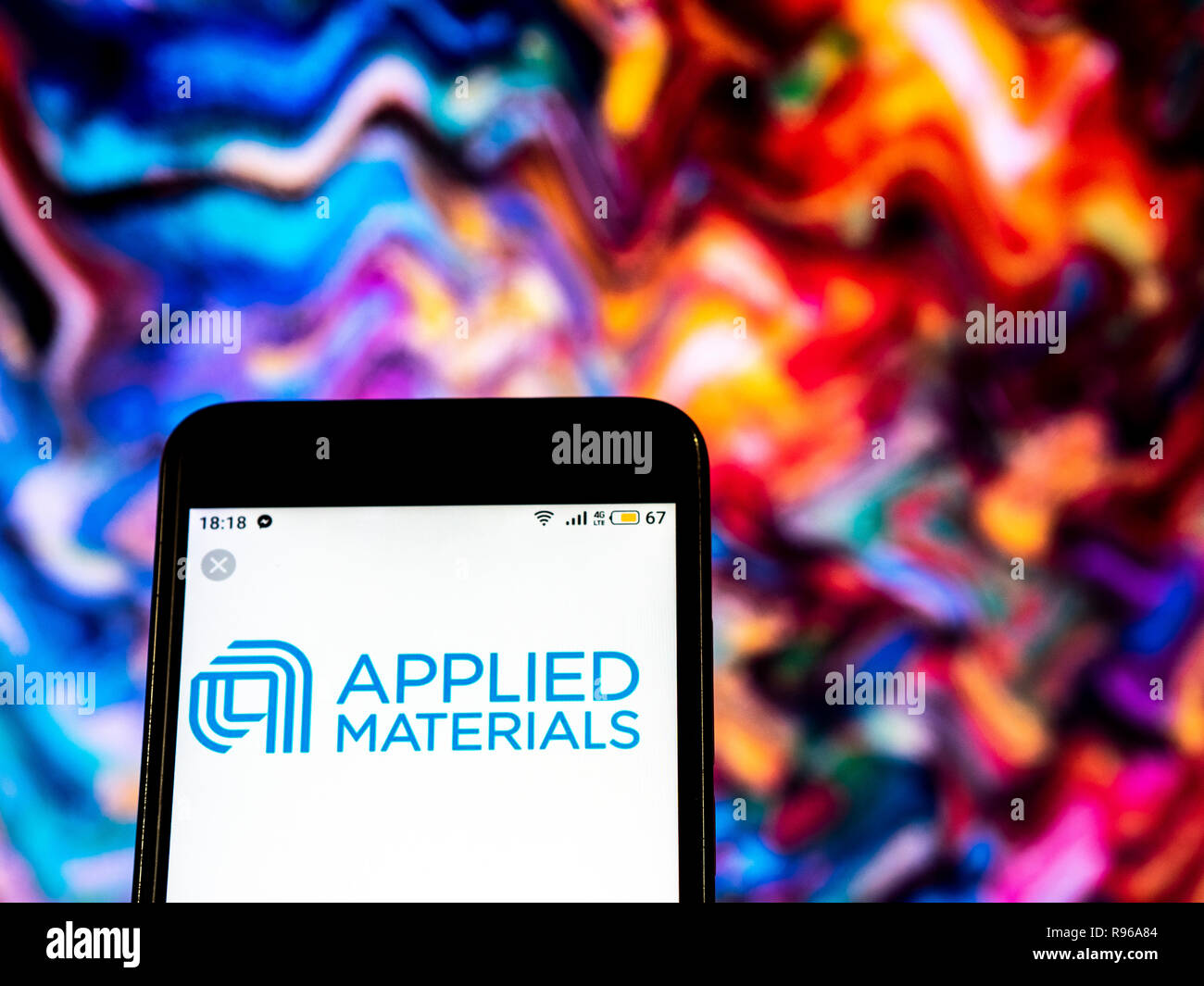 Applied Materials Manufacturing company logo seen displayed on smart ...