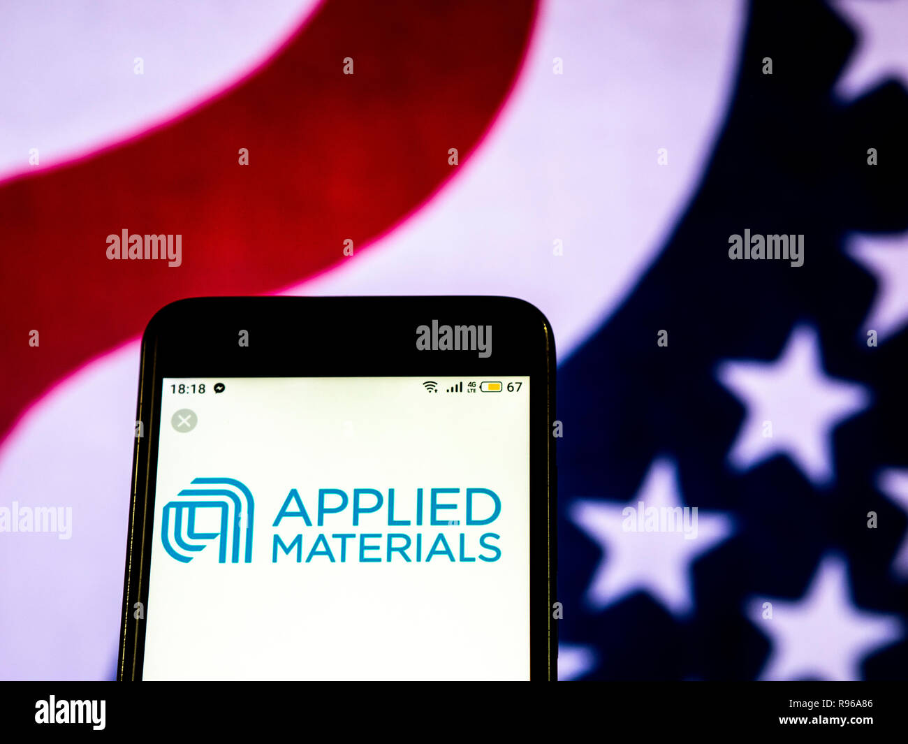 Applied Materials Manufacturing company logo seen displayed on smart ...