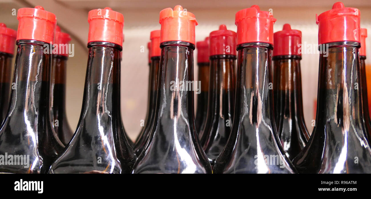 Soy sauce bottles on a shelf Stock Photo - Alamy