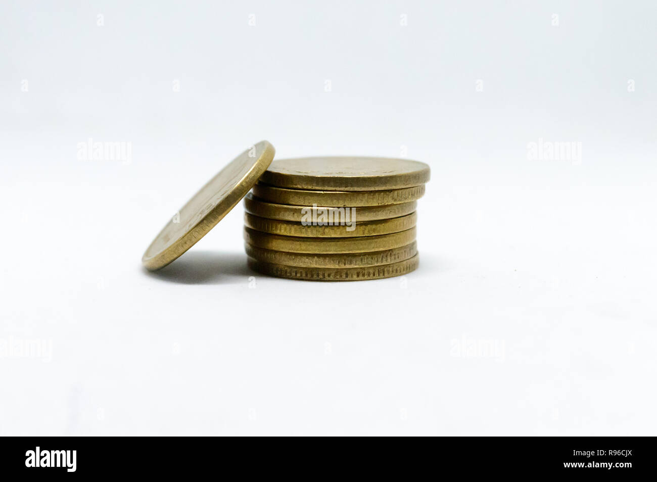 Stock pile of 5 Indian rupee metal coin currency on isolated white ...