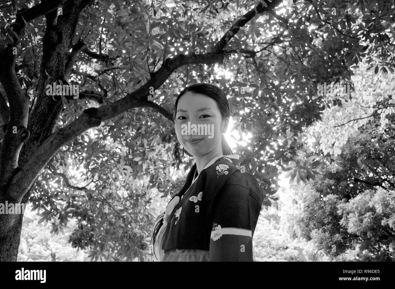 Asian female model poses for pictures in the nature Stock Photo - Alamy