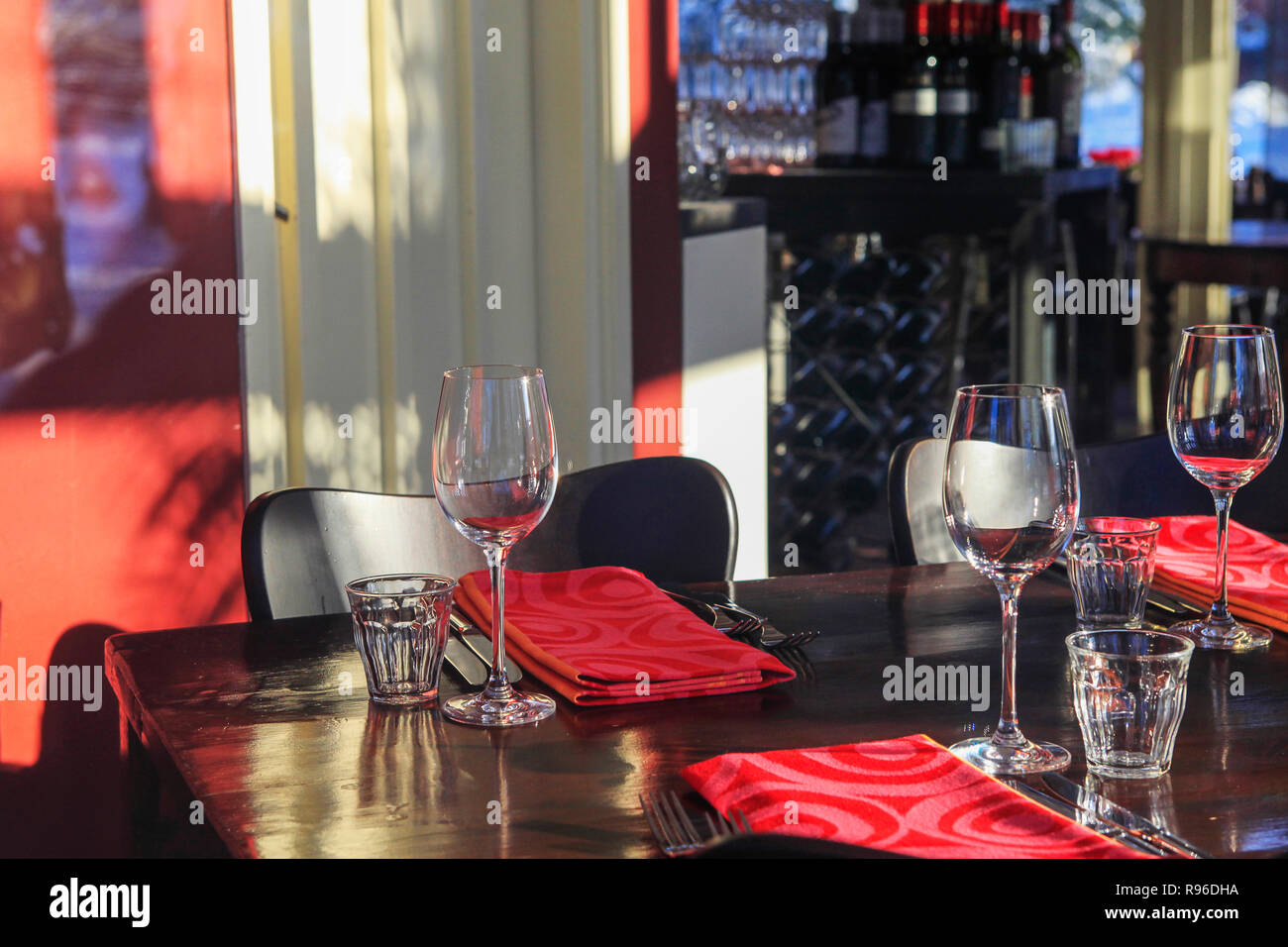 Restaurant interior in daytime with sunlight on wall Stock Photo - Alamy