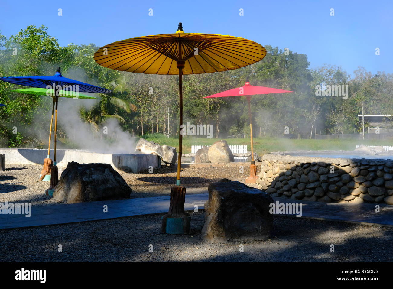 geyser eruption. exploding hot spring geothermal water in Sankampang in ...