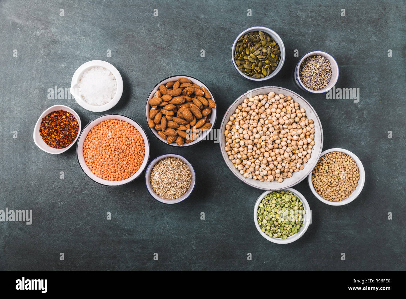 Composition of different types of legumes in bowls Stock Photo - Alamy
