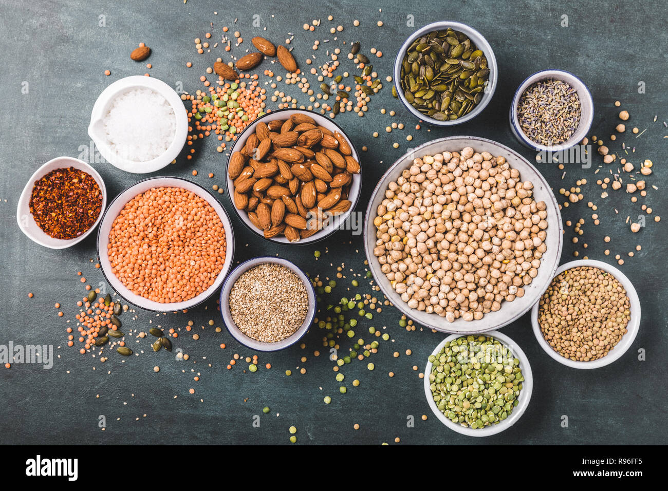 Composition of different types of legumes in bowls Stock Photo - Alamy
