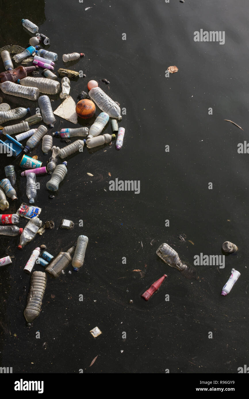 plastic pollution in water colourful packaging Stock Photo - Alamy