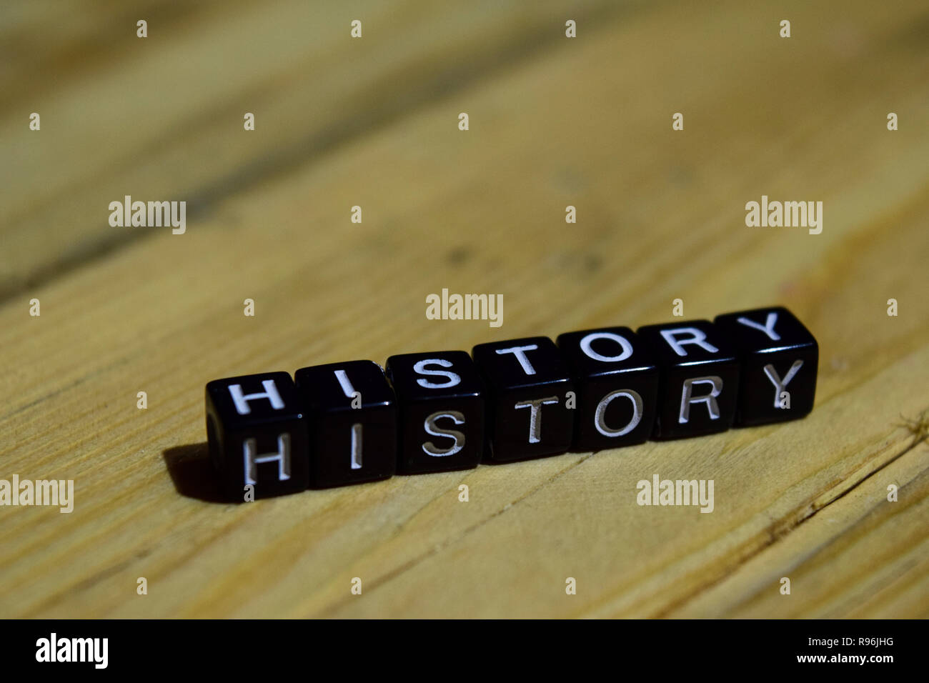 History written on wooden blocks. Inspiration and motivation concepts ...