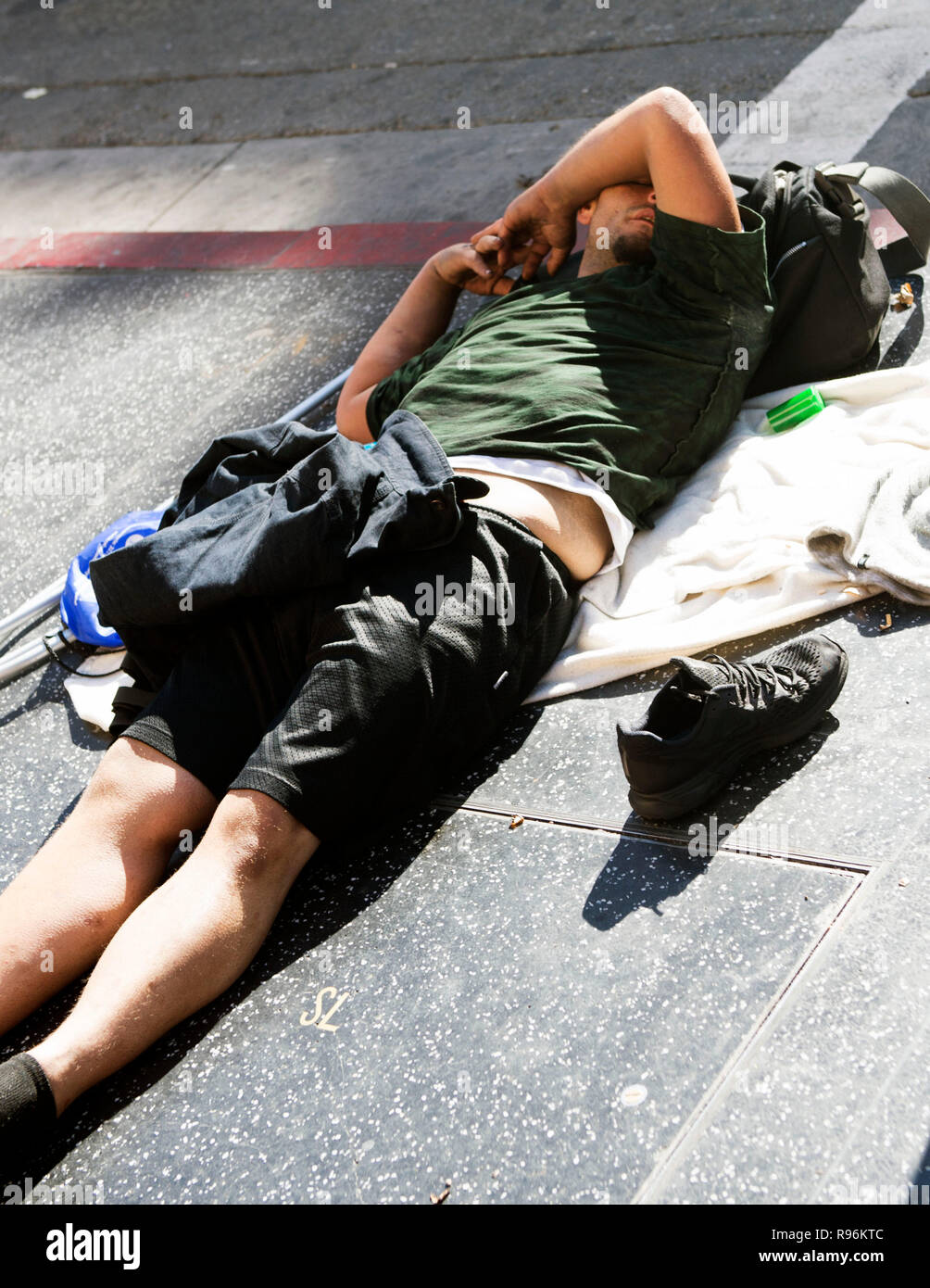 Hollywood, California, USA. December 19, 2018: A homeless man lay on ...