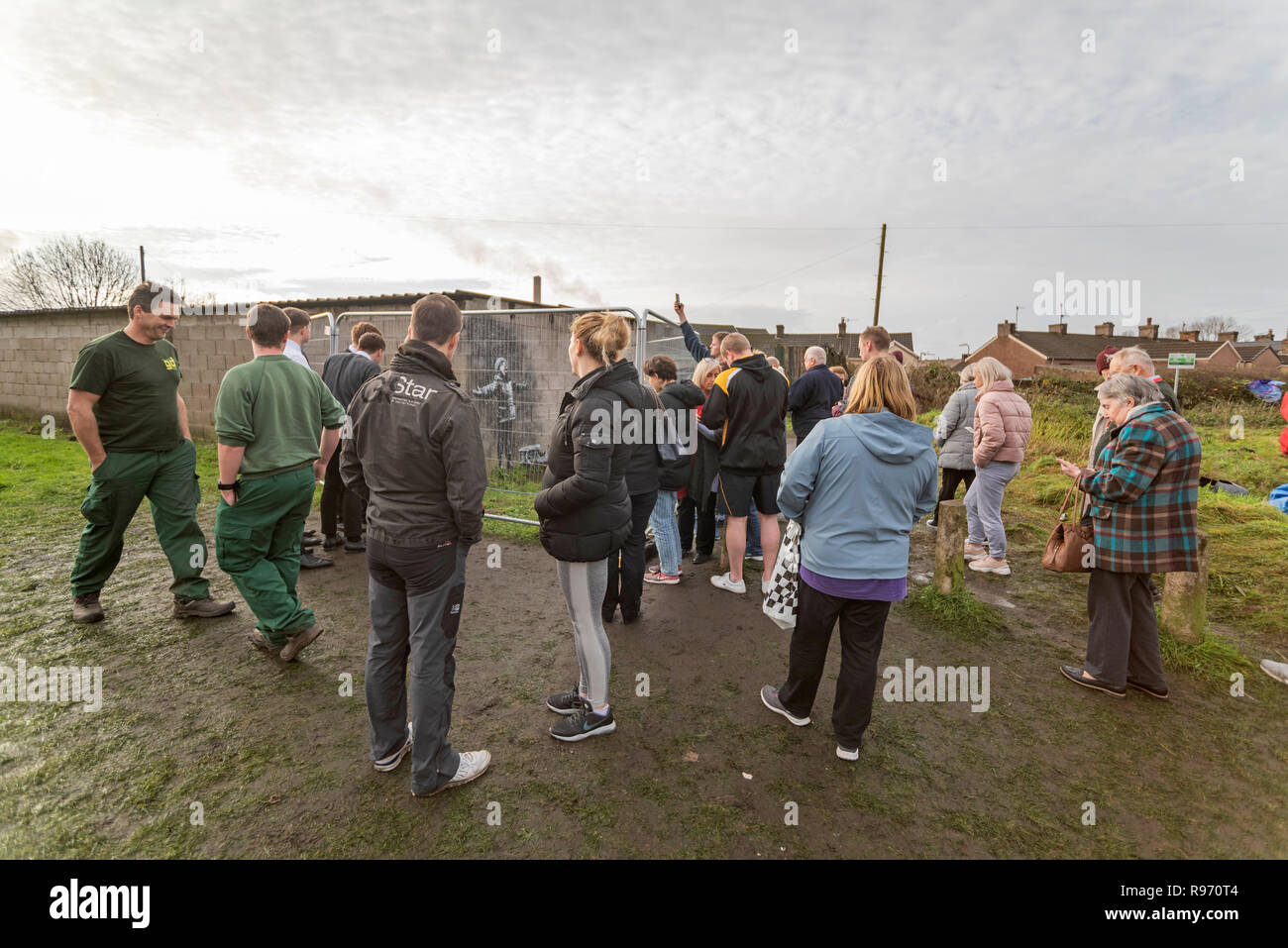 Crowds turn up to see Banksy's 'Seasons Greetings' artwork at Port ...