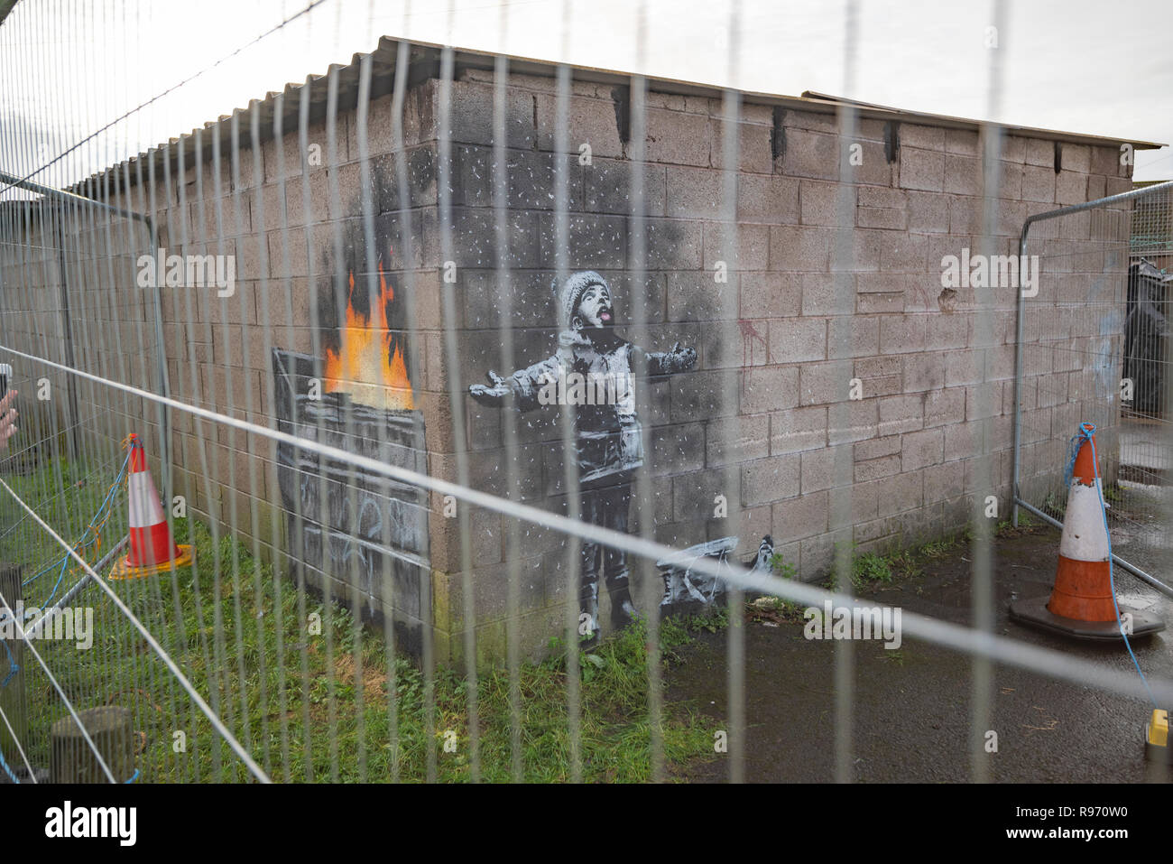 Crowds turn up to see Banksy's 'Seasons Greetings' artwork at Port ...