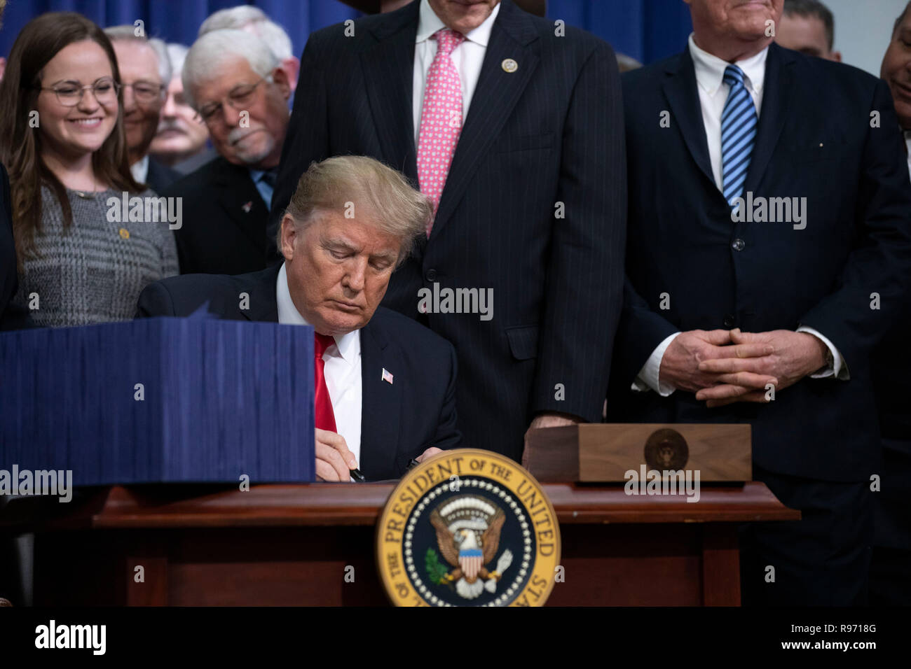 US President Donald Trump signs the Farm Bill into law at the White ...