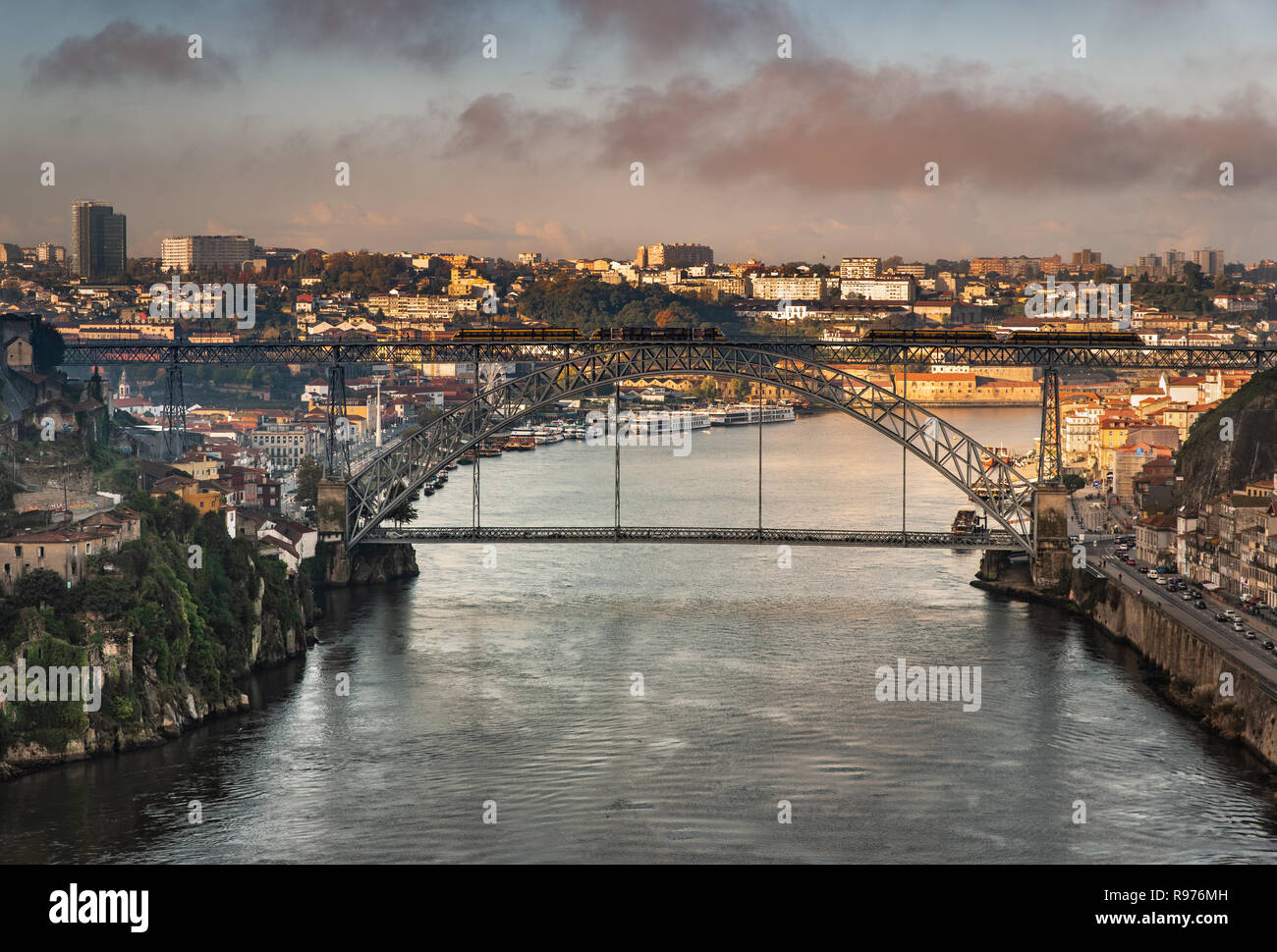 View at Ponte Luis I bridge in Porto in the morning golden hour Stock ...