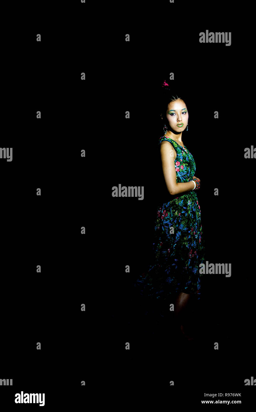 Asian female model poses for pictures in the nature Stock Photo - Alamy