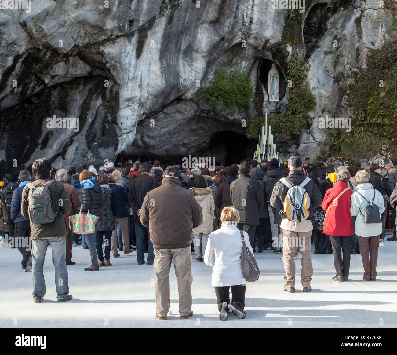 Lourdes grotto kneeling hi-res stock photography and images - Alamy