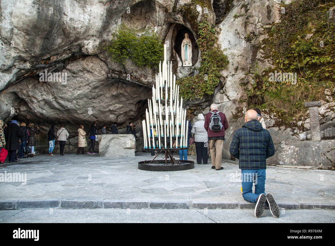 Lourdes grotto kneeling hi-res stock photography and images - Alamy