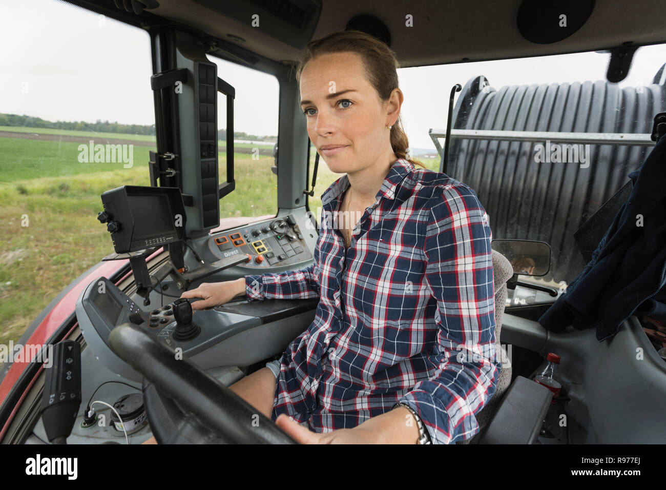 Driving a tractor hi-res stock photography and images - Alamy
