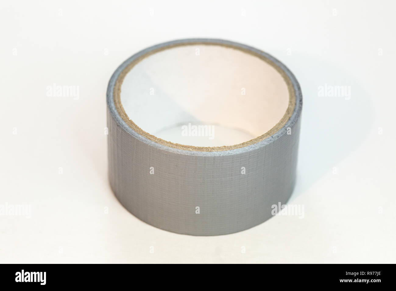 Roll of silver gaffer tape on white background Stock Photo - Alamy