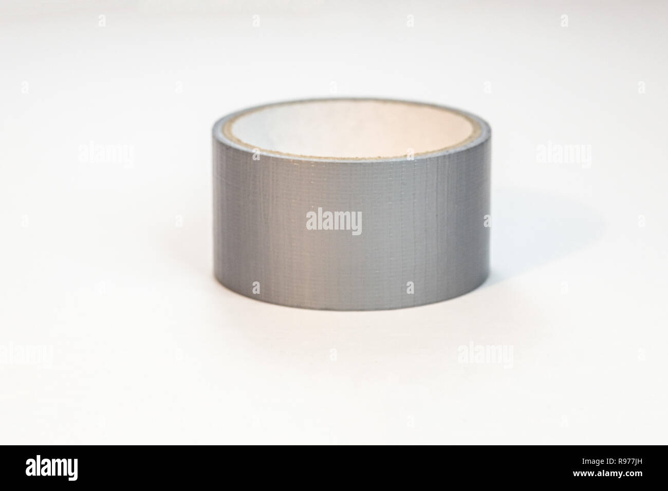 Roll of silver gaffer tape on white background Stock Photo - Alamy