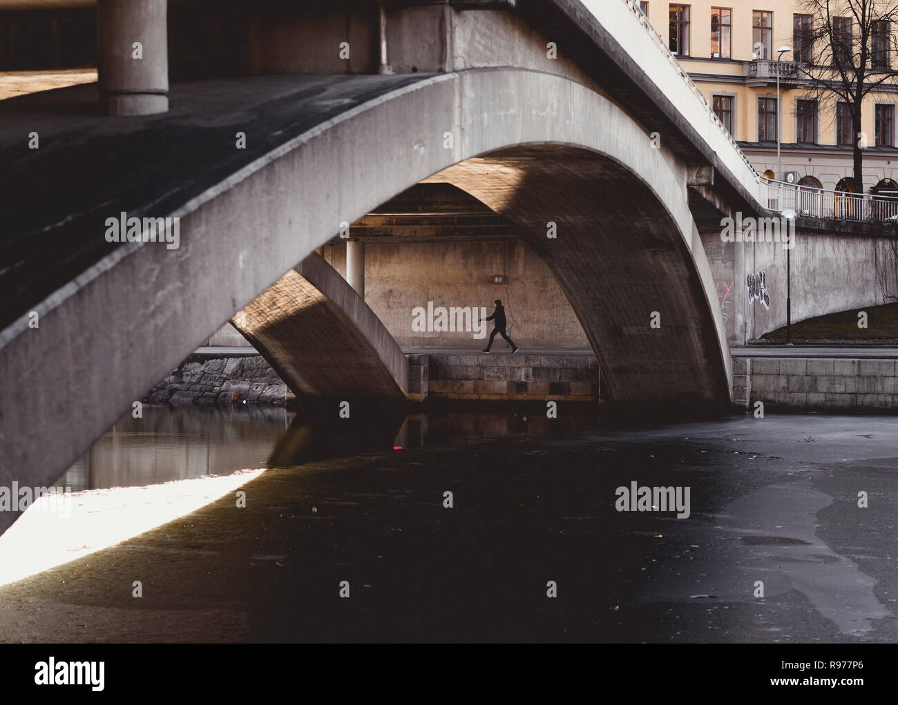 Person walking bridge hi-res stock photography and images - Alamy