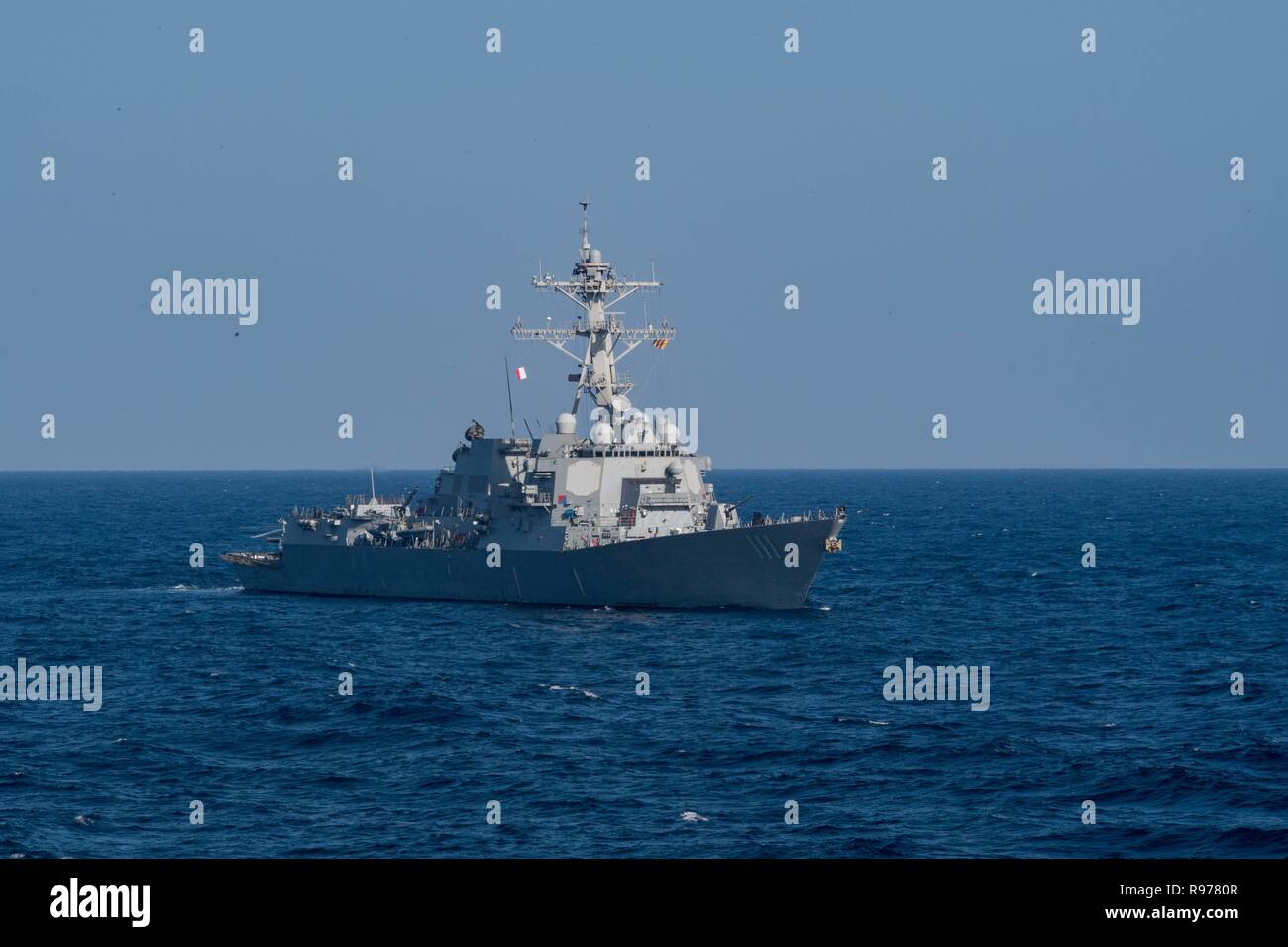The guided-missile destroyer USS Spruance (DDG 111) cuts through the ...