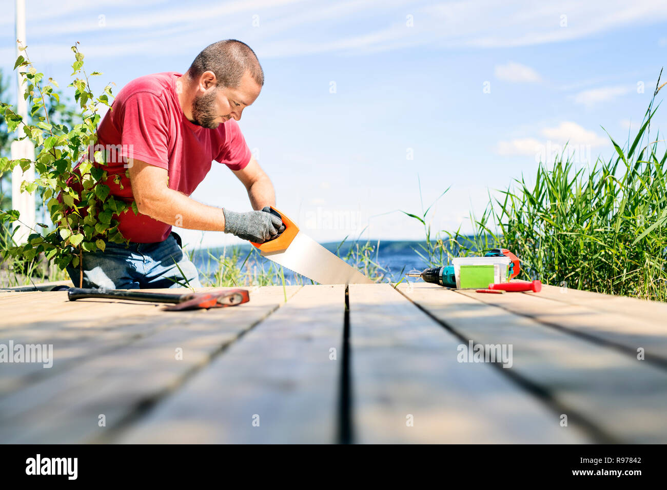 Man working deck hi-res stock photography and images - Alamy
