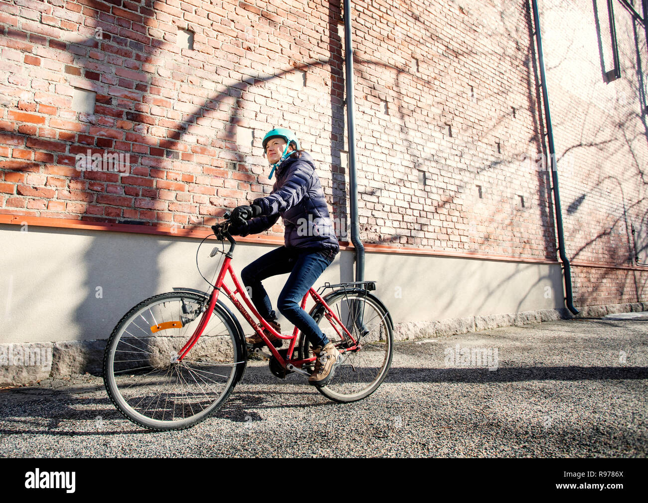 Adult riding bicycle hi-res stock photography and images - Alamy