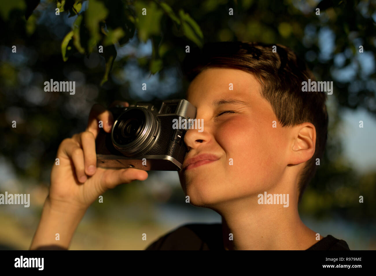 Male teen taking photos hi-res stock photography and images - Alamy