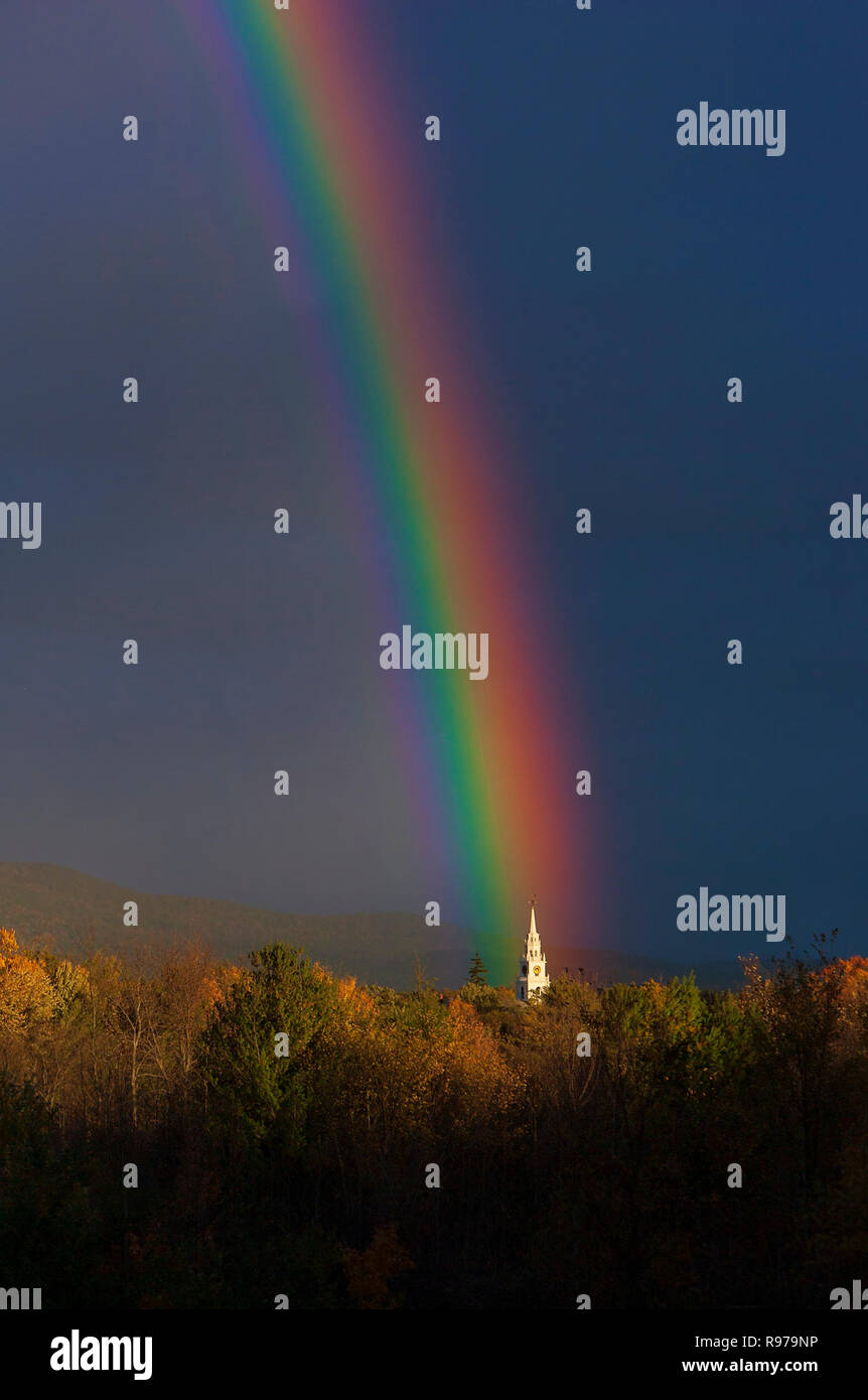 A rainbow over the Congregational Church in Middlebury, Vermont, a ...