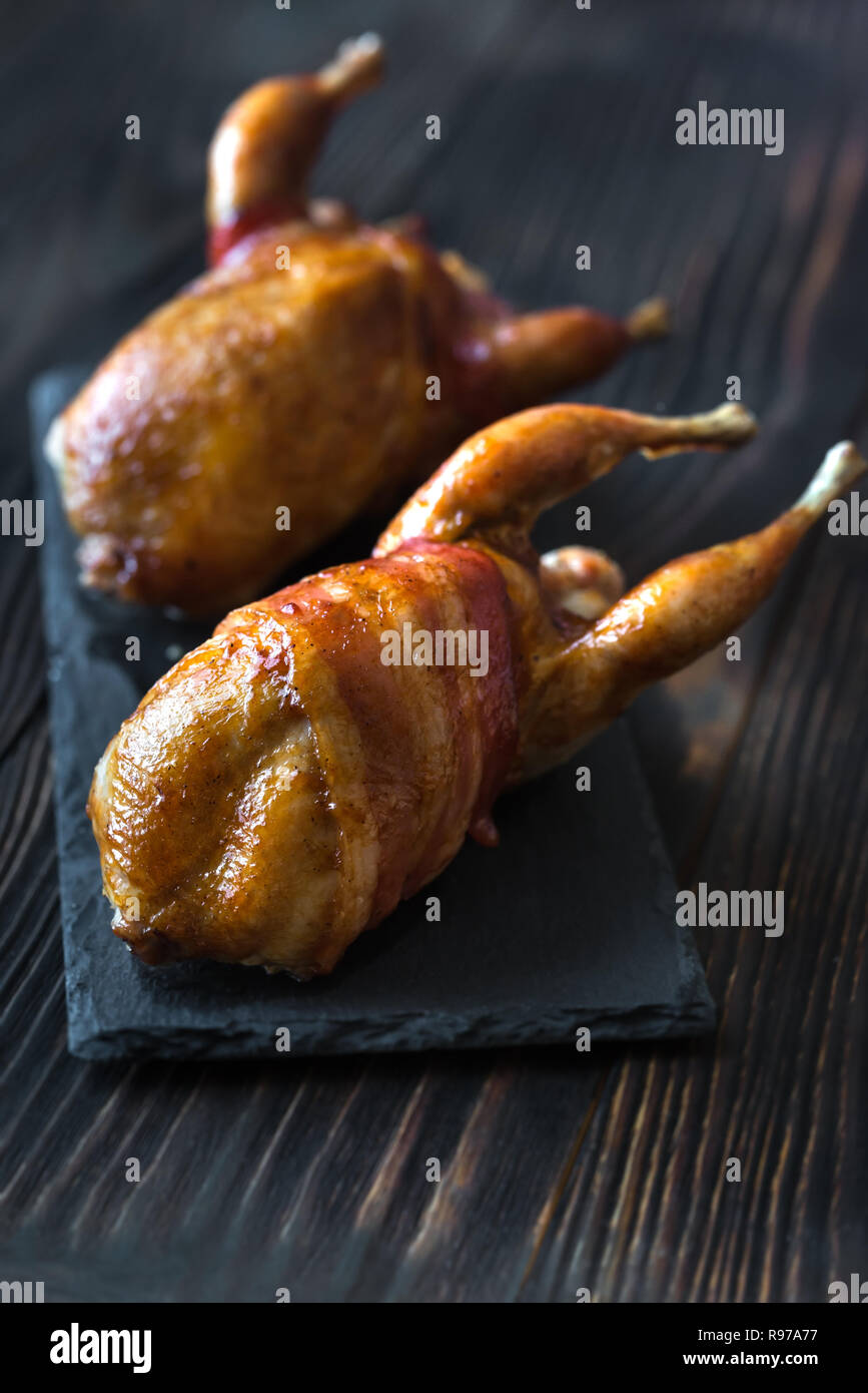 Whole quail wrapped in bacon hi-res stock photography and images - Alamy