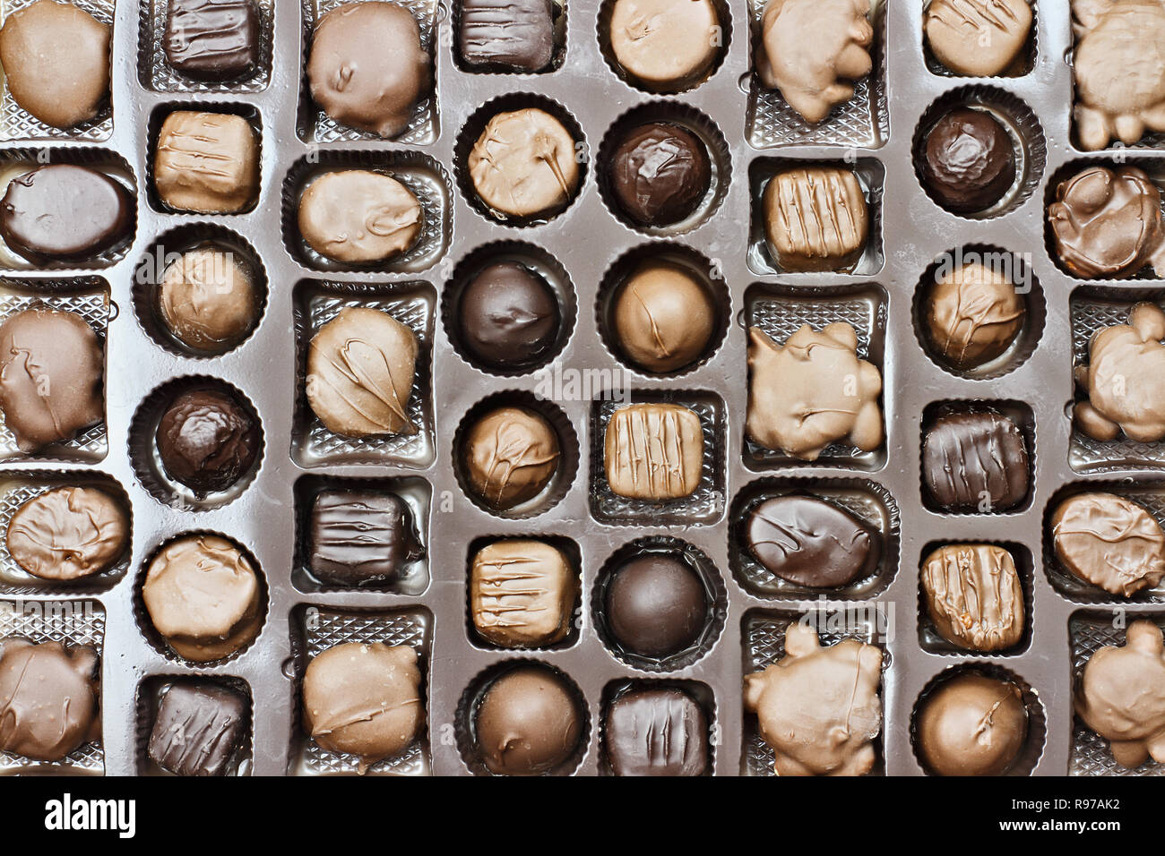 Assorted box chocolates top view hi-res stock photography and images ...