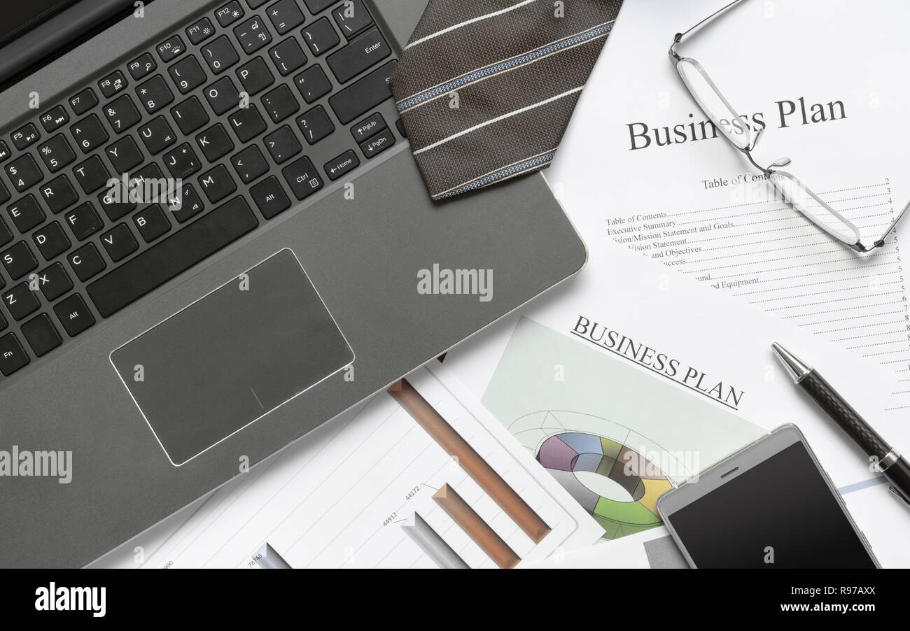 Writing Business plan preparation concept. Business still-life with ...