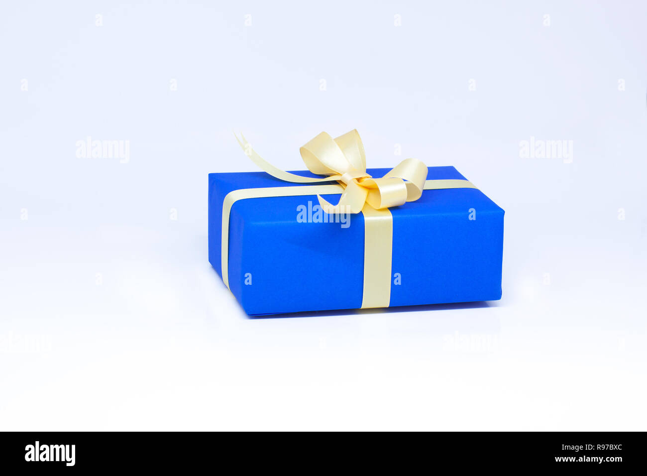 Blue gift box on isolated on white background Stock Photo - Alamy