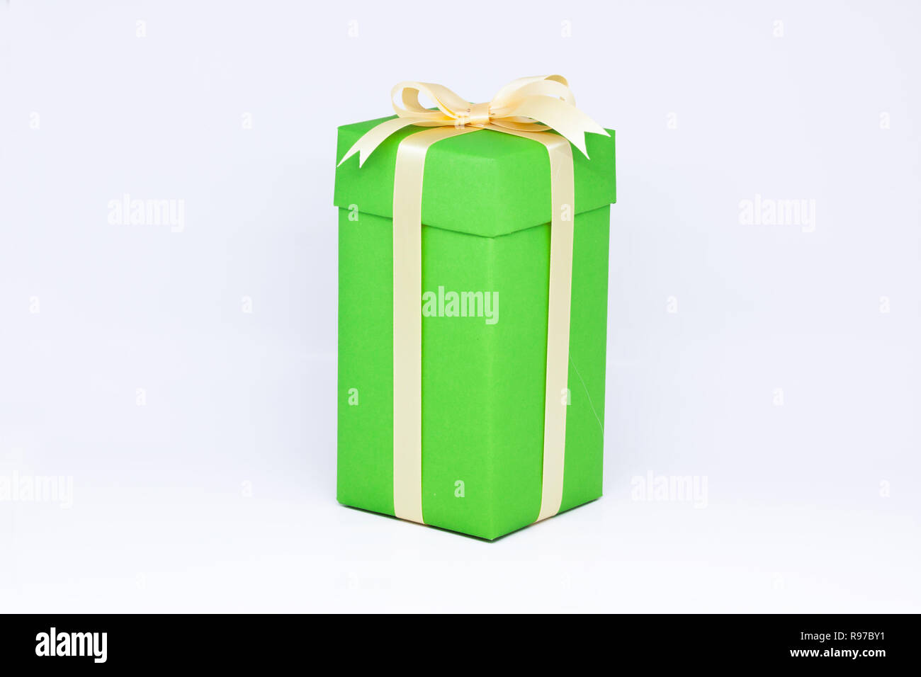 Green gift box on isolated on white background Stock Photo - Alamy
