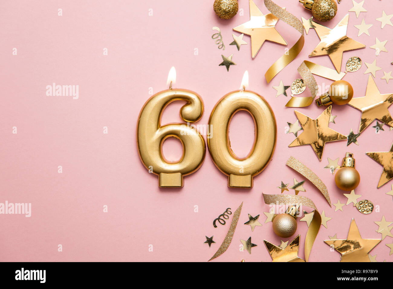 Number 60 gold celebration candle on star and glitter background Stock ...