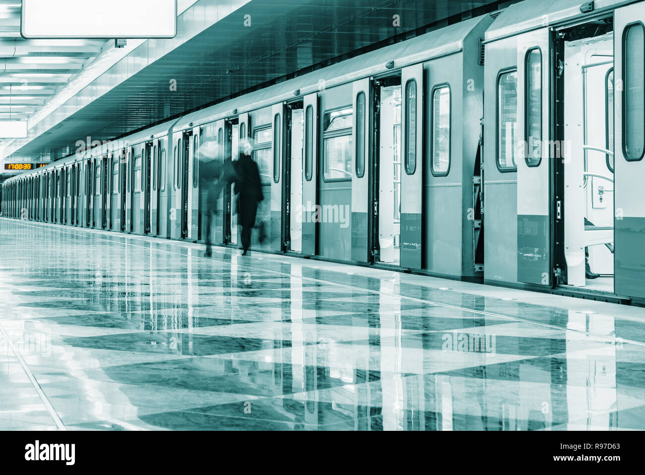Subway train stands by the platform before departure Stock Photo - Alamy
