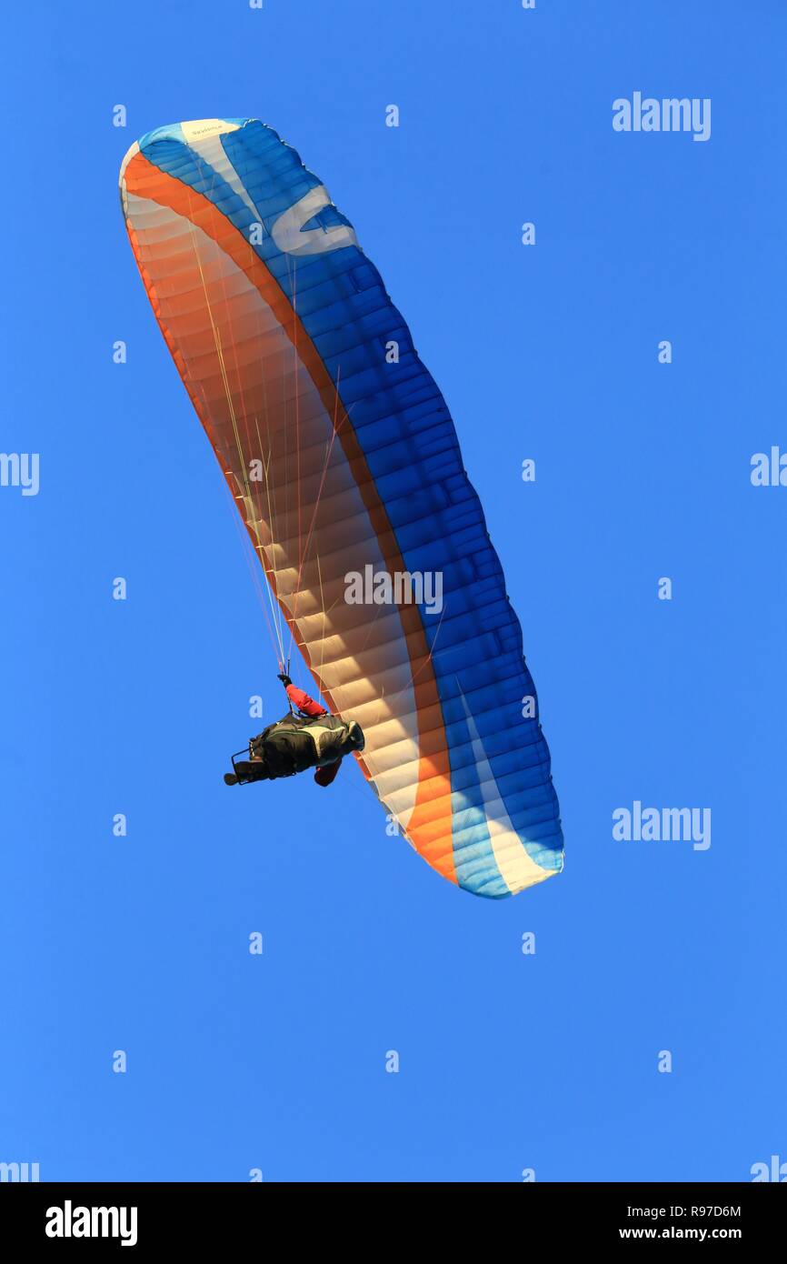 Extreme para-glider in the cold winter sky Stock Photo - Alamy