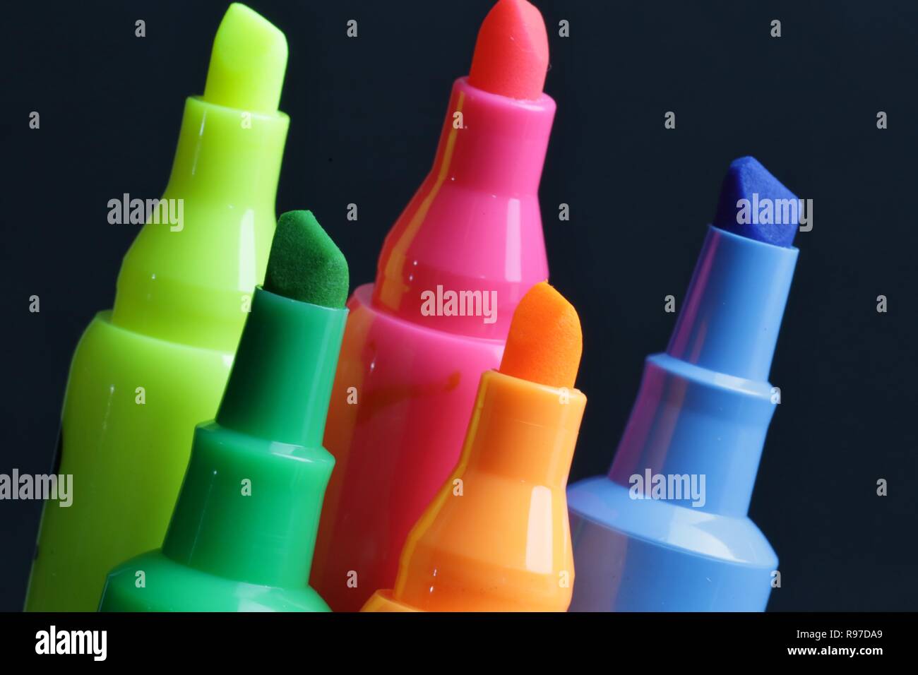 Assortment of neon pen highlighters Stock Photo - Alamy