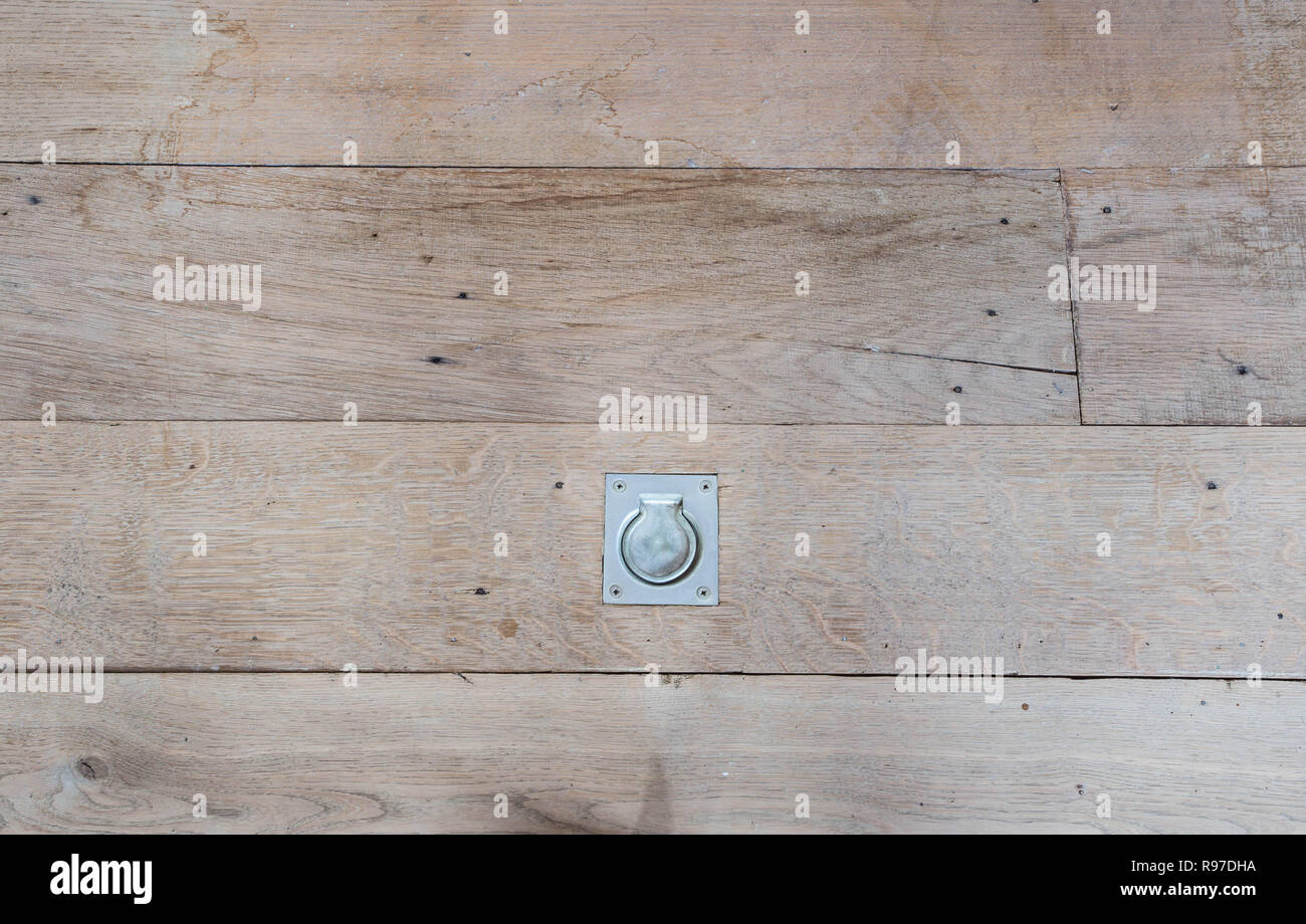 Crawl space hatch wood floor texture home construction Stock Photo - Alamy