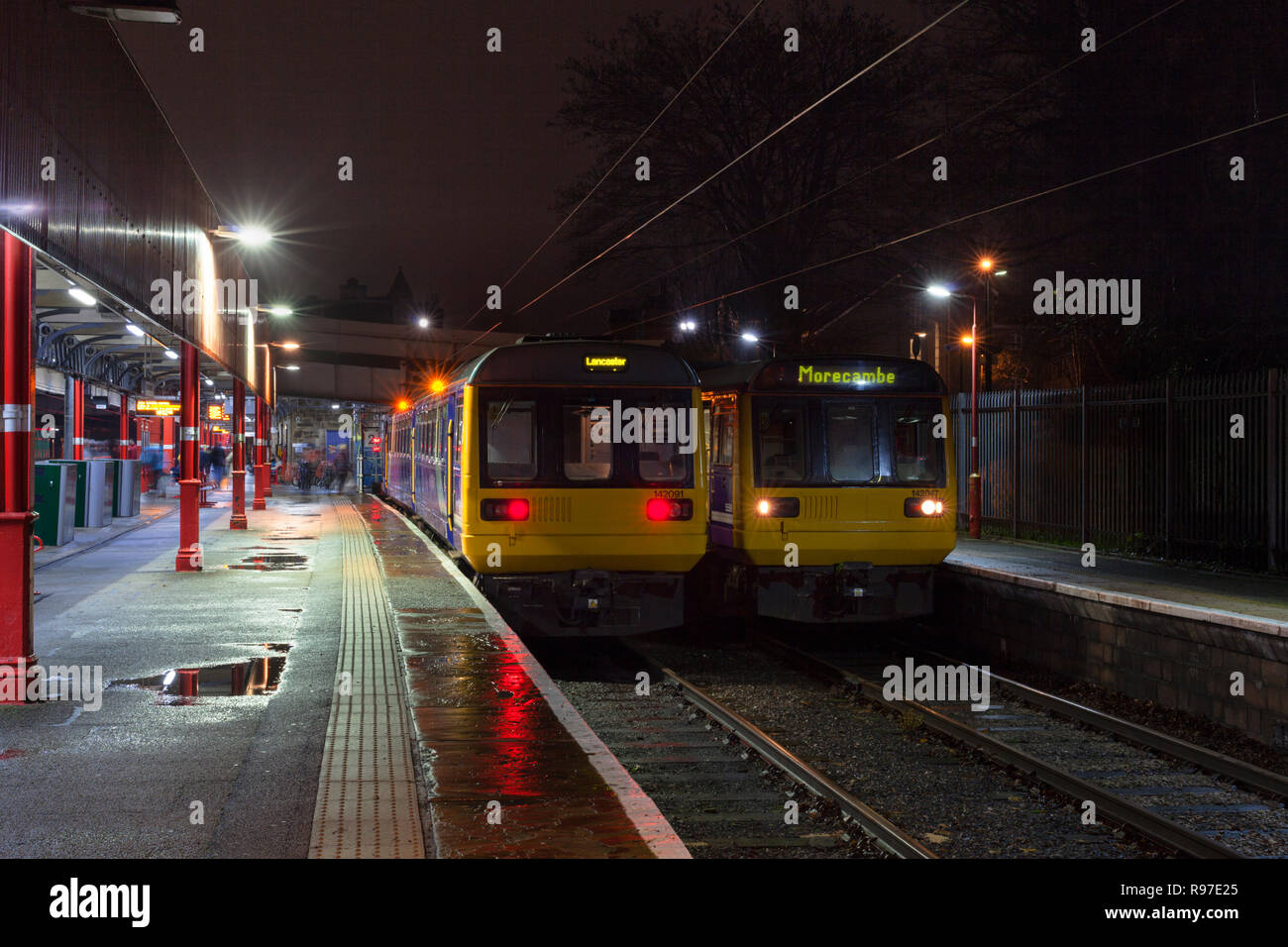 2 Arriva Northern rail class 142 pacer trains at Lancaster with trains to and from Morecambe ...