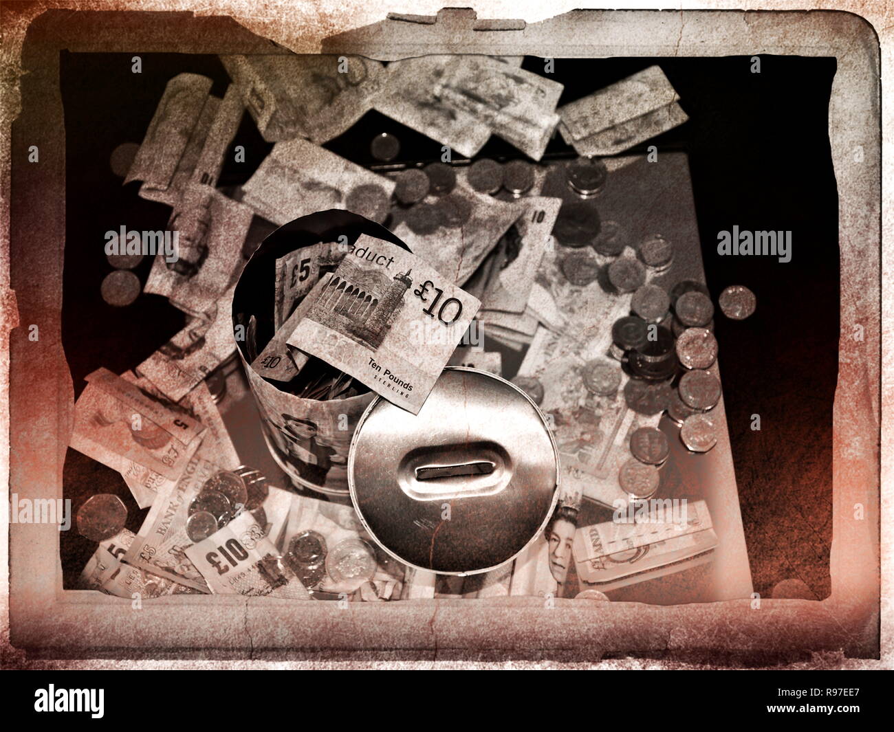 photos of British pounds after opening the money box Stock Photo - Alamy