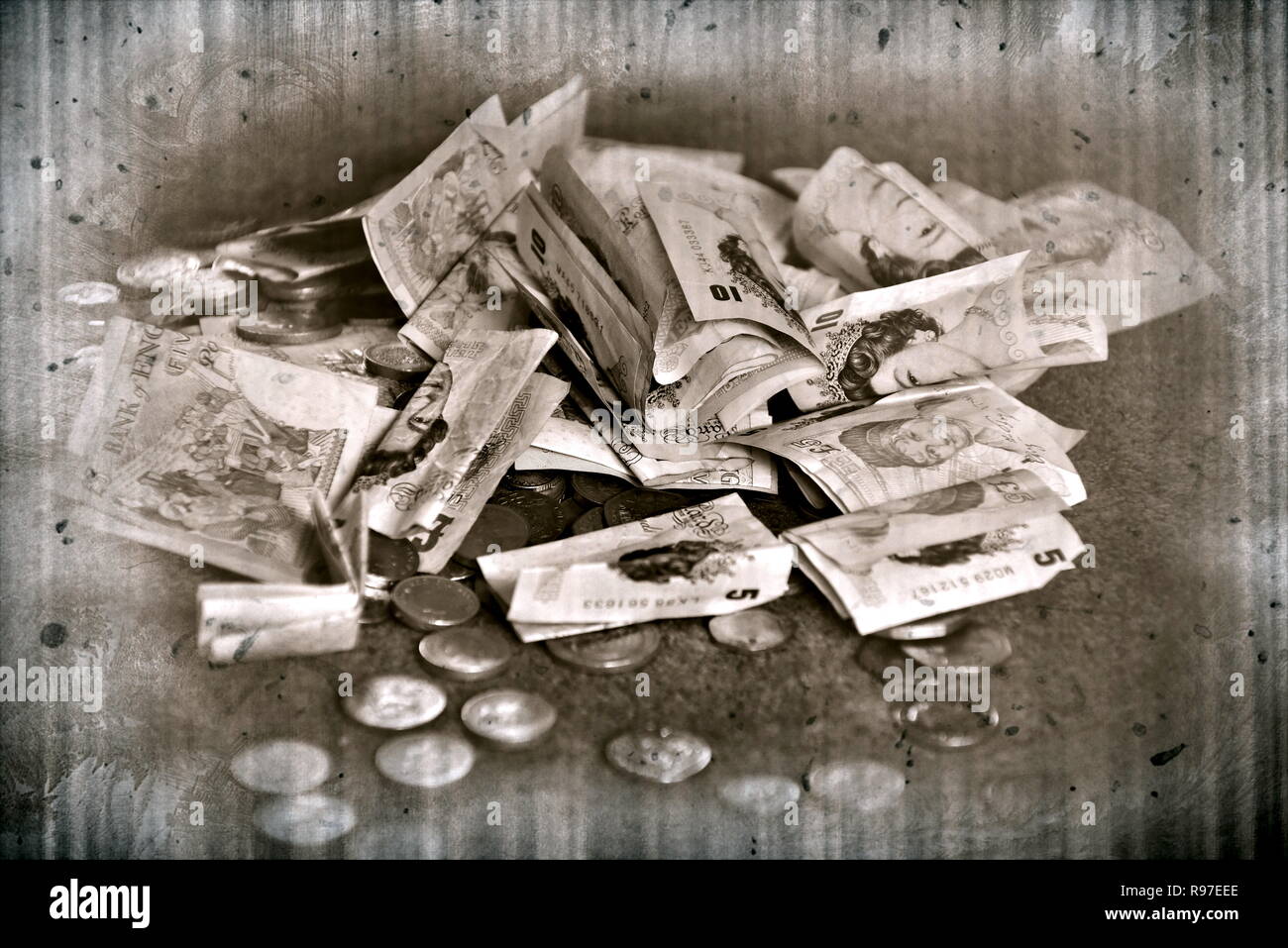 photos of British pounds after opening the money box Stock Photo - Alamy
