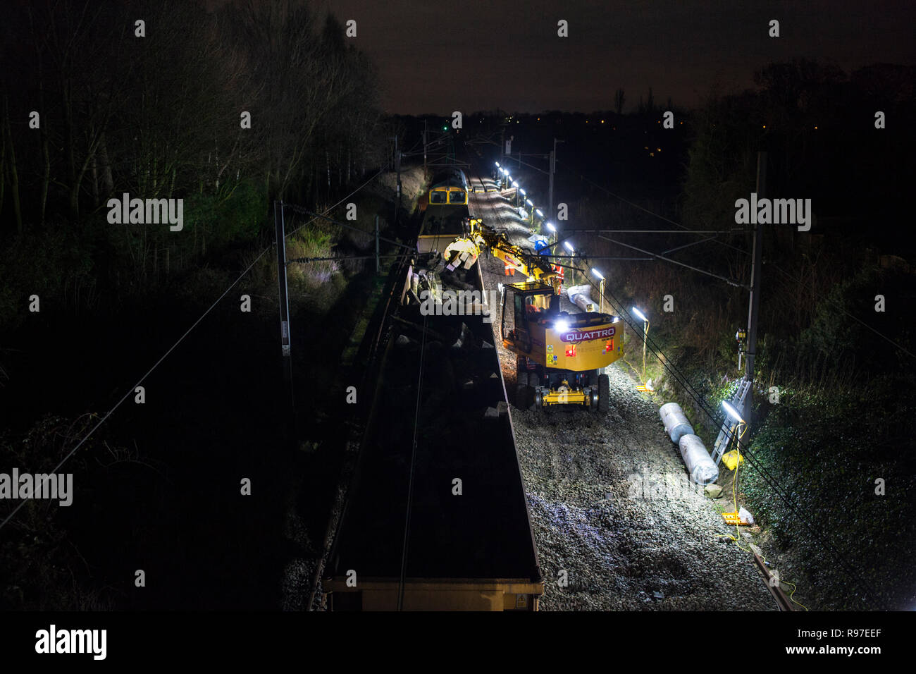 Network Rail track renewal under way during a night time possession on ...