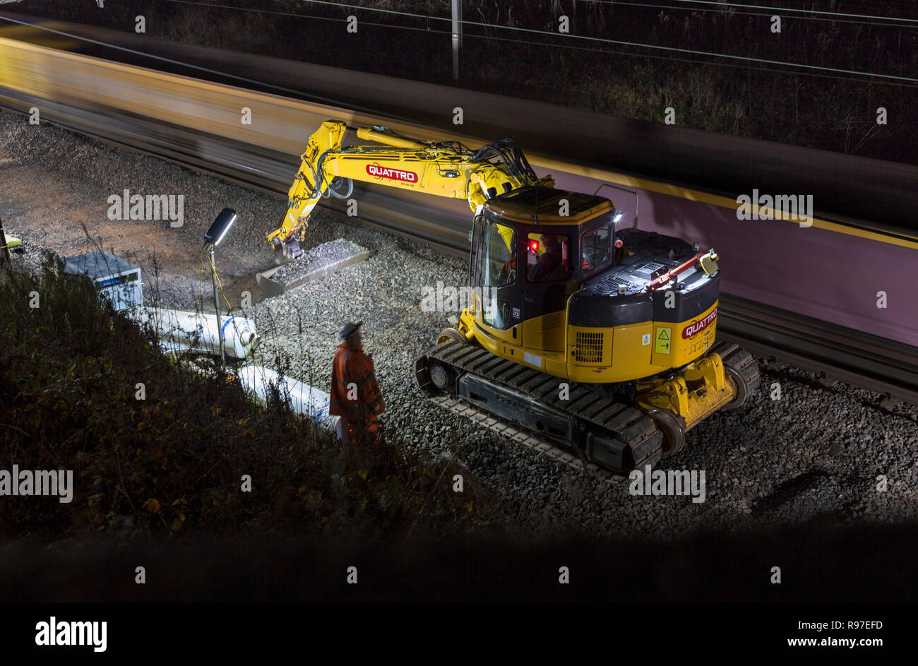 Network Rail track renewal under way during a night time possession on ...