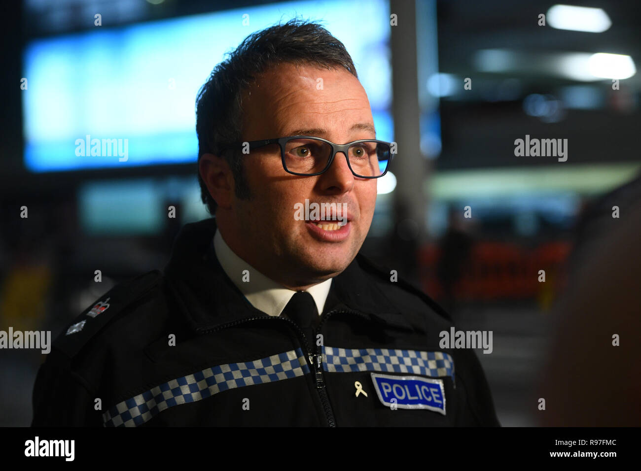 Sussex Police Detective Chief Superintendent Jason Tingley speaking to ...